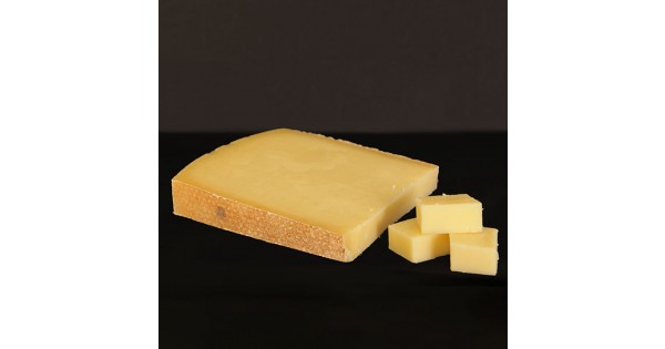 Comté au lait de vache à la forme d'une meule de 8 à 13 cm | Pâte ...